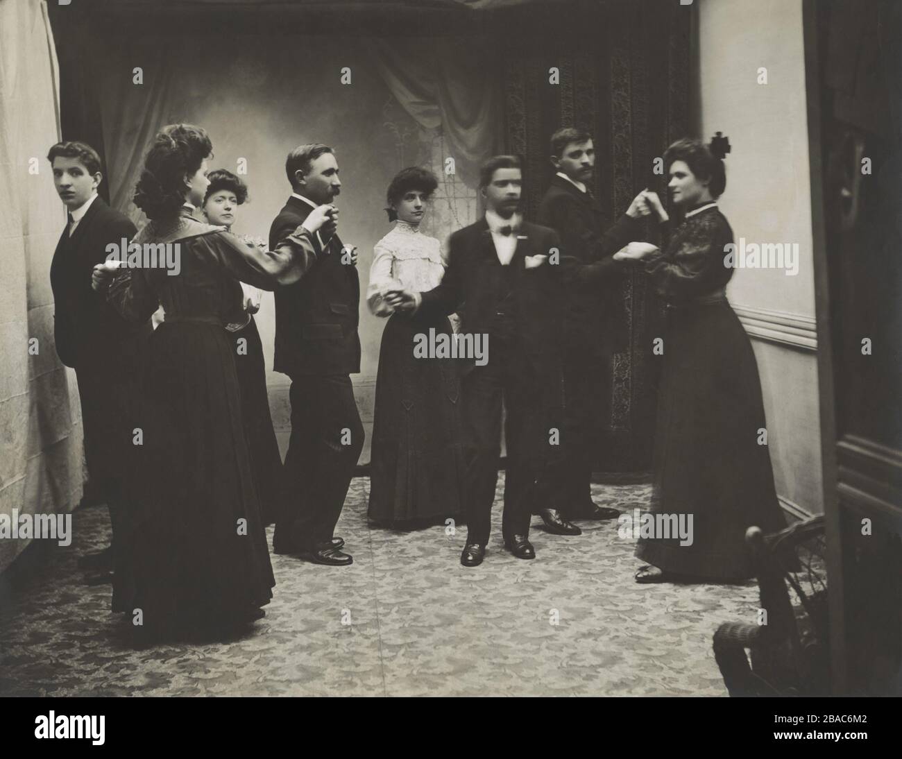 Young Irish American men and women executing an 'eight hand reel' in ...