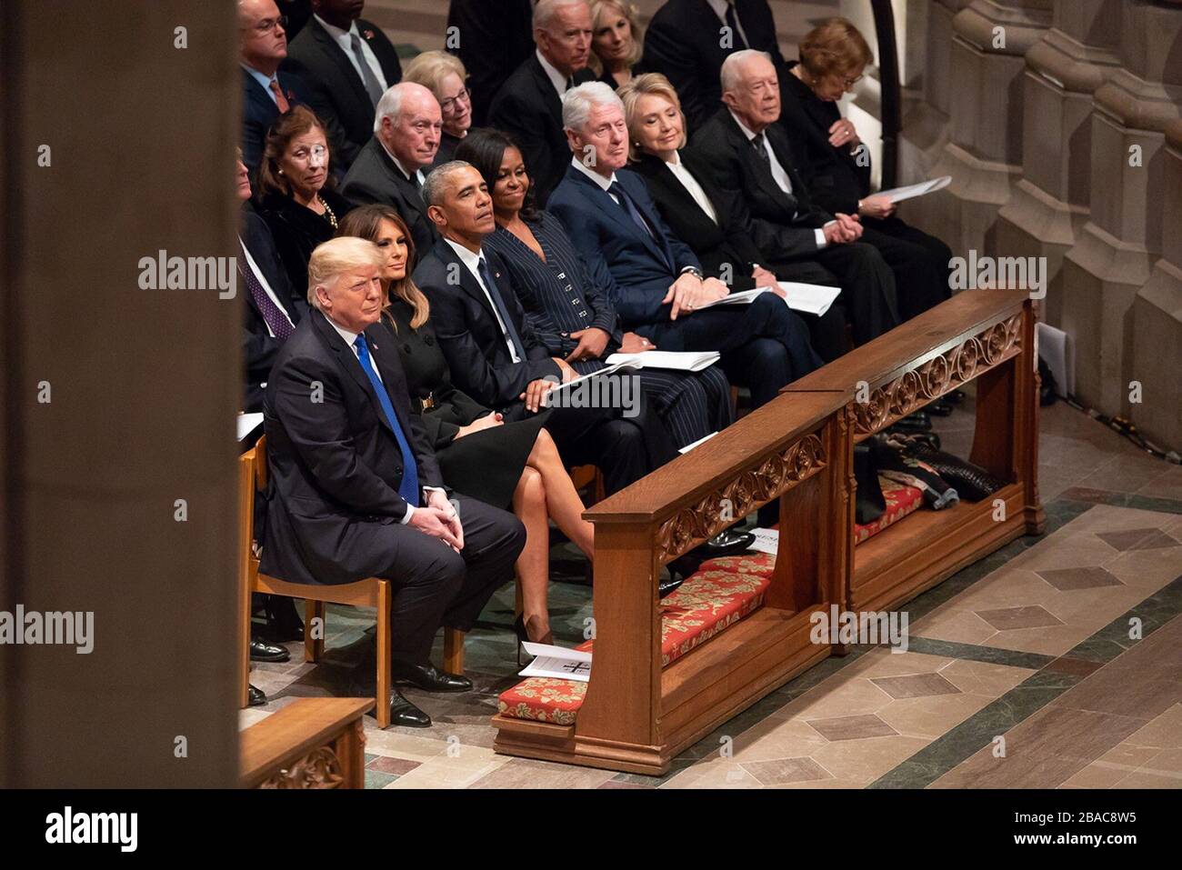 Four living US Presidents seated in the same pew at the funeral service ...