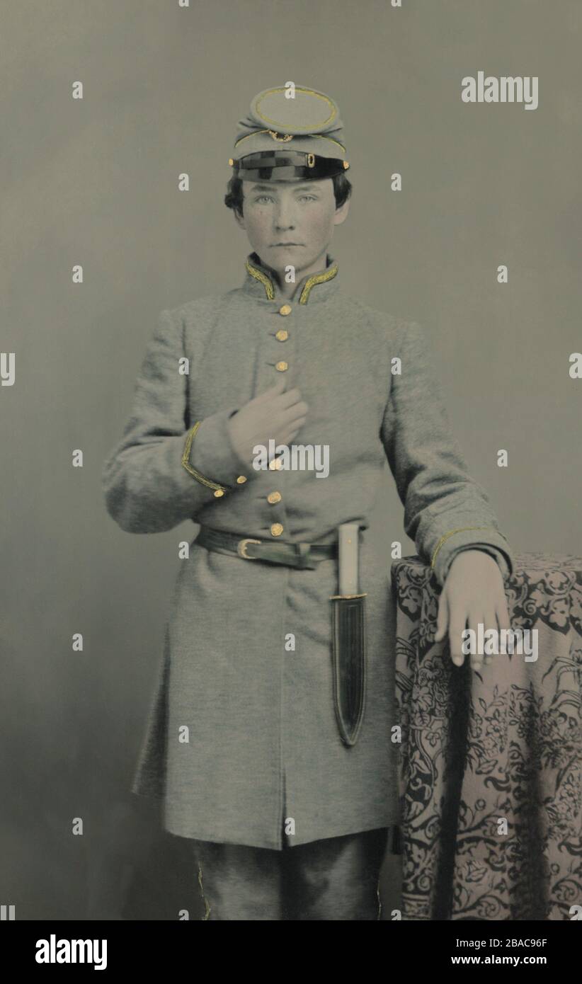 Teenage Confederate soldier in uniform with a Bowie knife on his belt ...