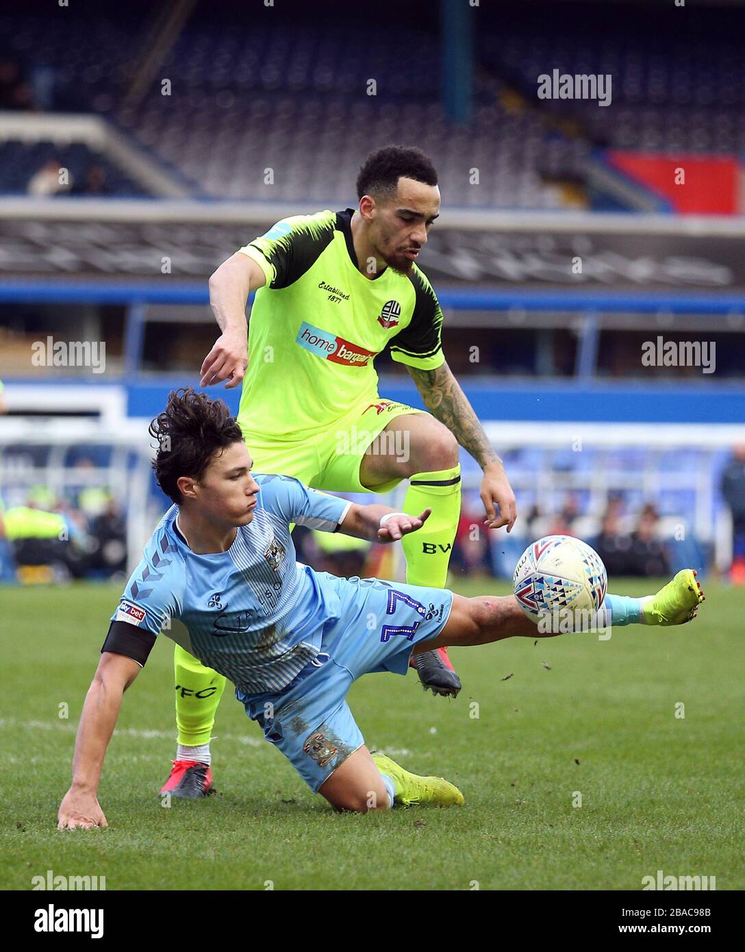 Coventry City's Callum O'Hare (front) and Bolton Wanderers' Kean Bryan ...