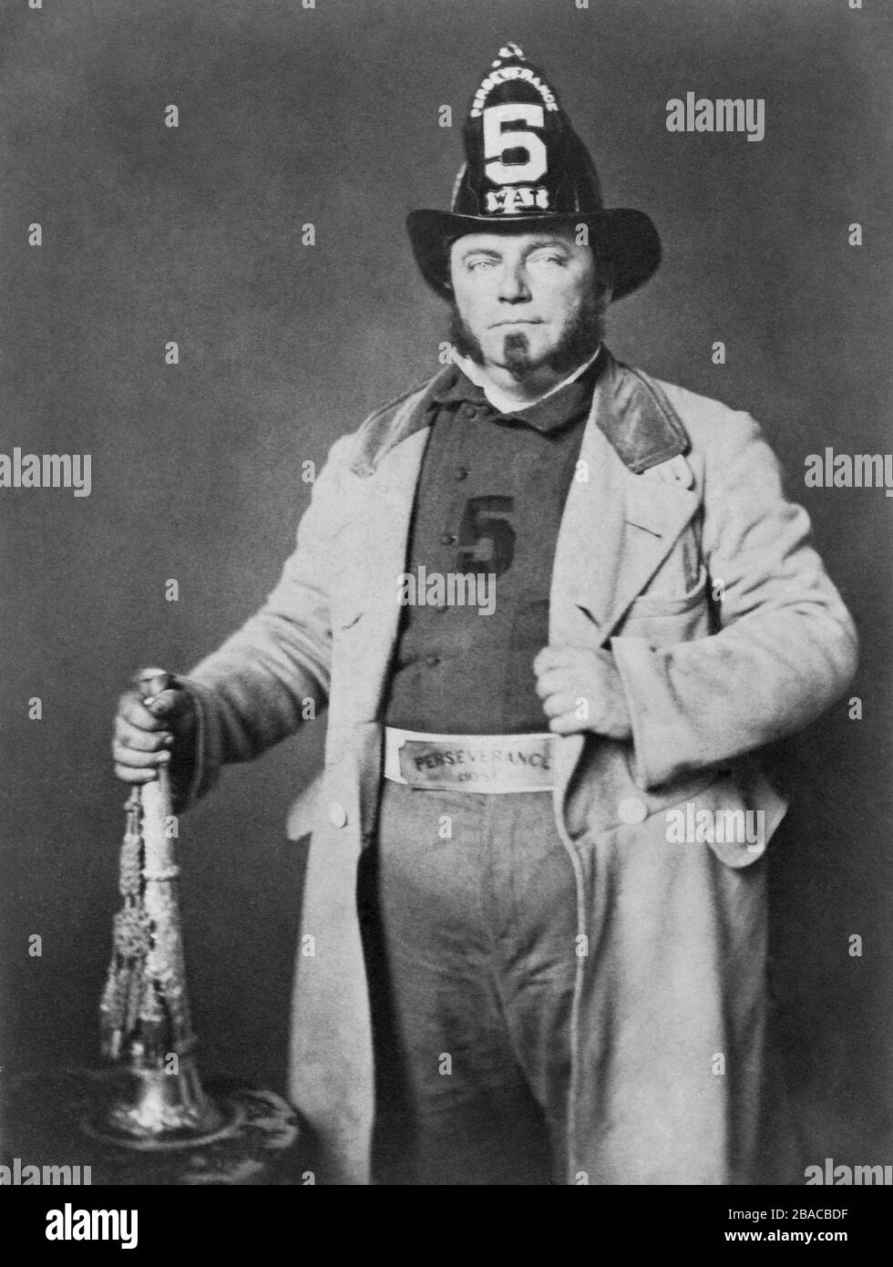 Portrait of fireman from the Perseverance Hose Company wears a fireman ...