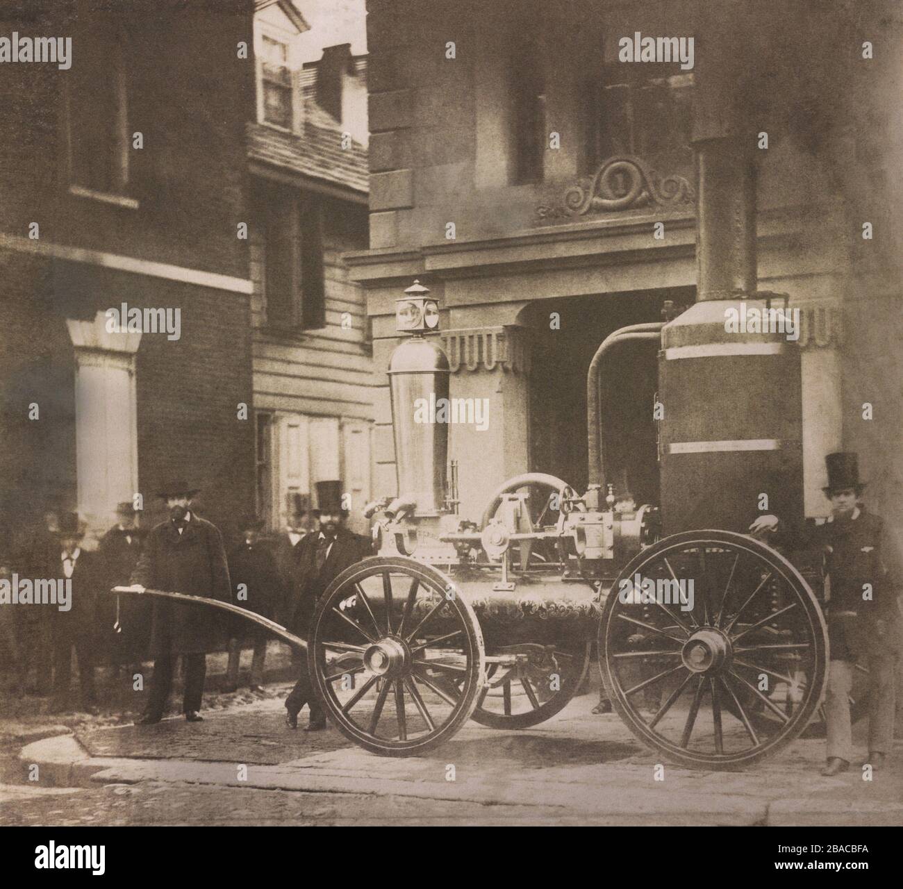 Philadelphia fire company poses with an early mobile steam pressurized ...