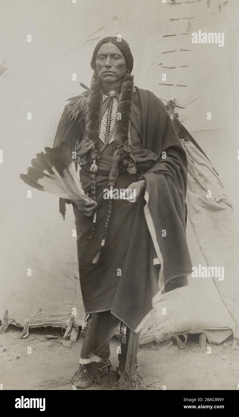 Quanah Parker, Principle Chief of Comanche Indians, ca. 1885, stands in ...
