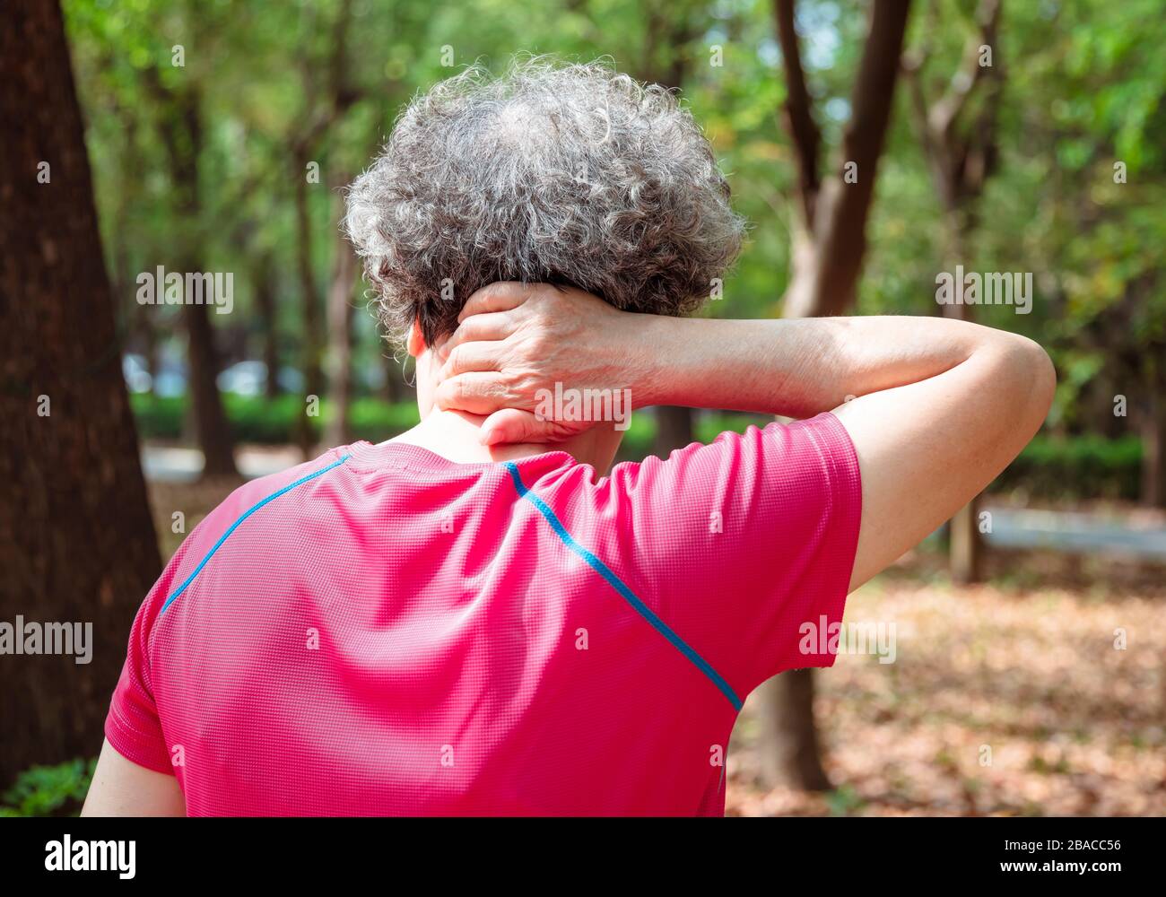 senior woman having neck pain Stock Photo - Alamy