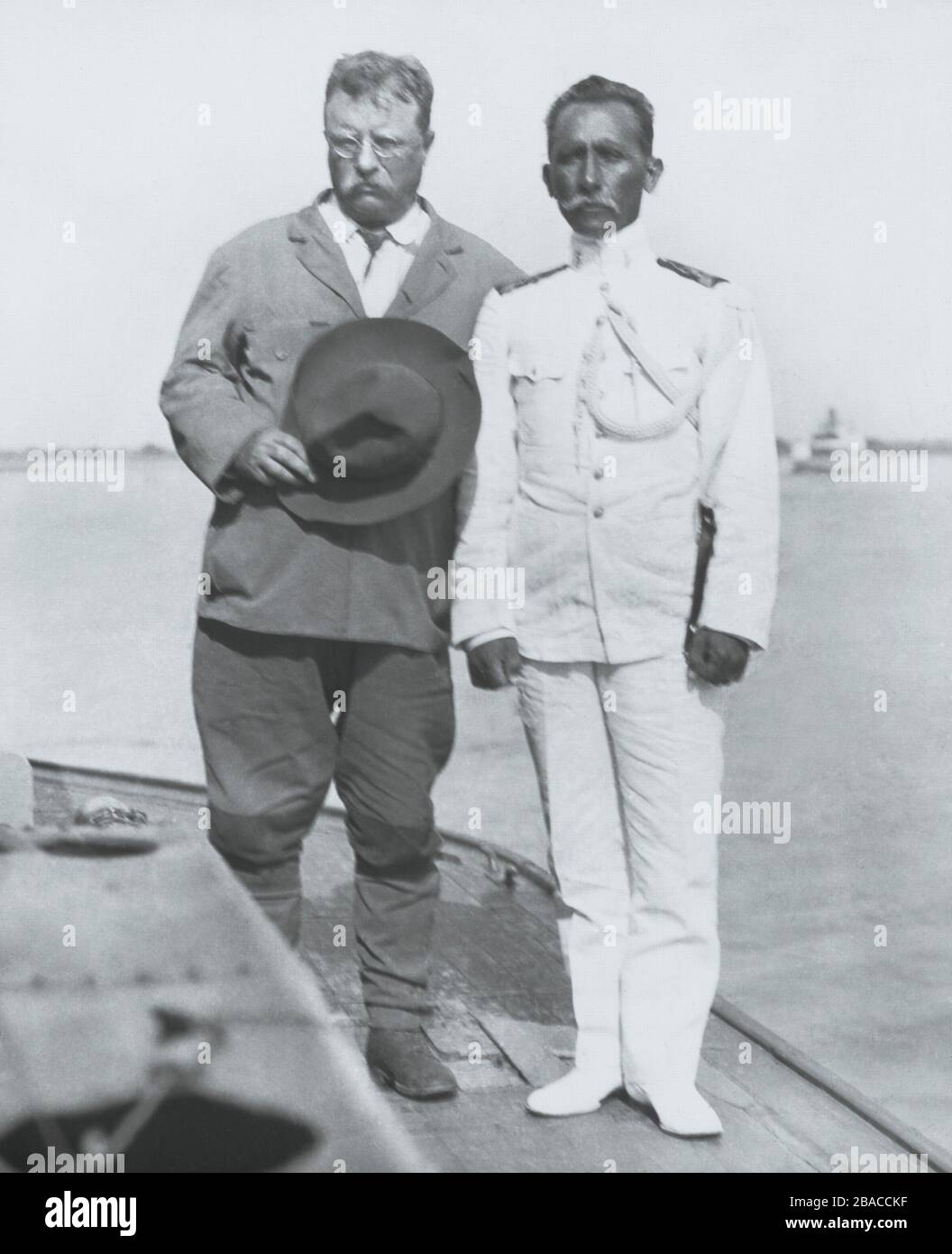 President Theodore Roosevelt stands on a boat with Marshal Cândido ...