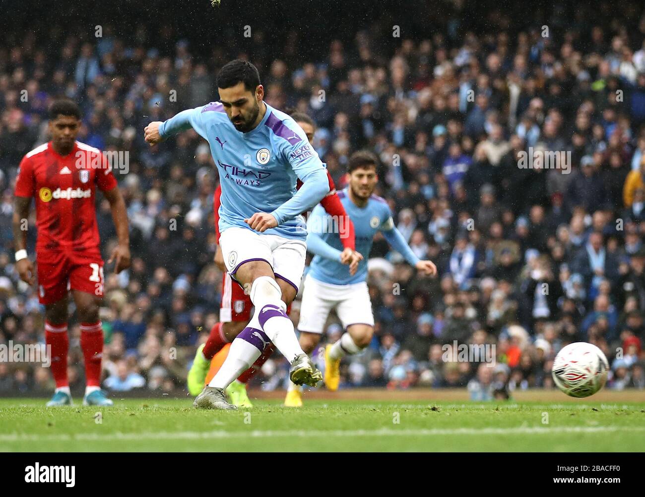 Manchester City's Ilkay Gundogan scores his side's first goal of the ...