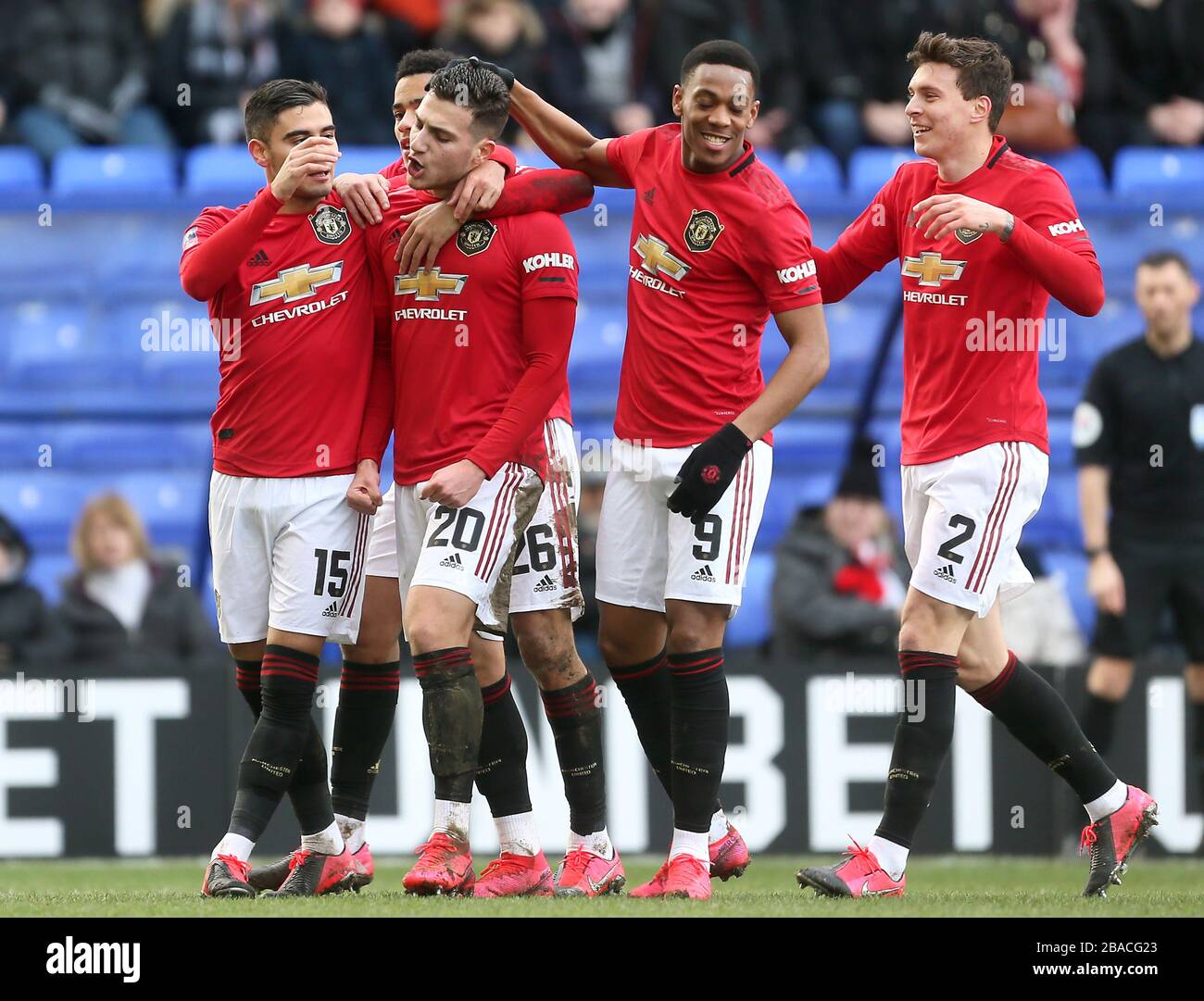 Manchester United's Diogo Dalot (centre left) scores his side's second ...