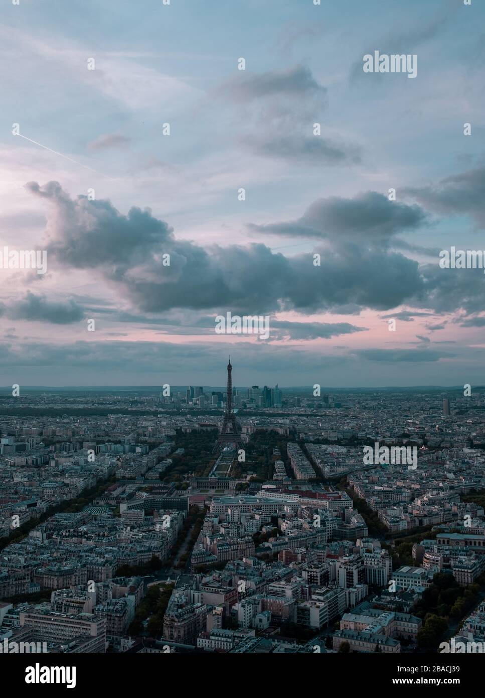 Paris skyline at sunset Stock Photo - Alamy