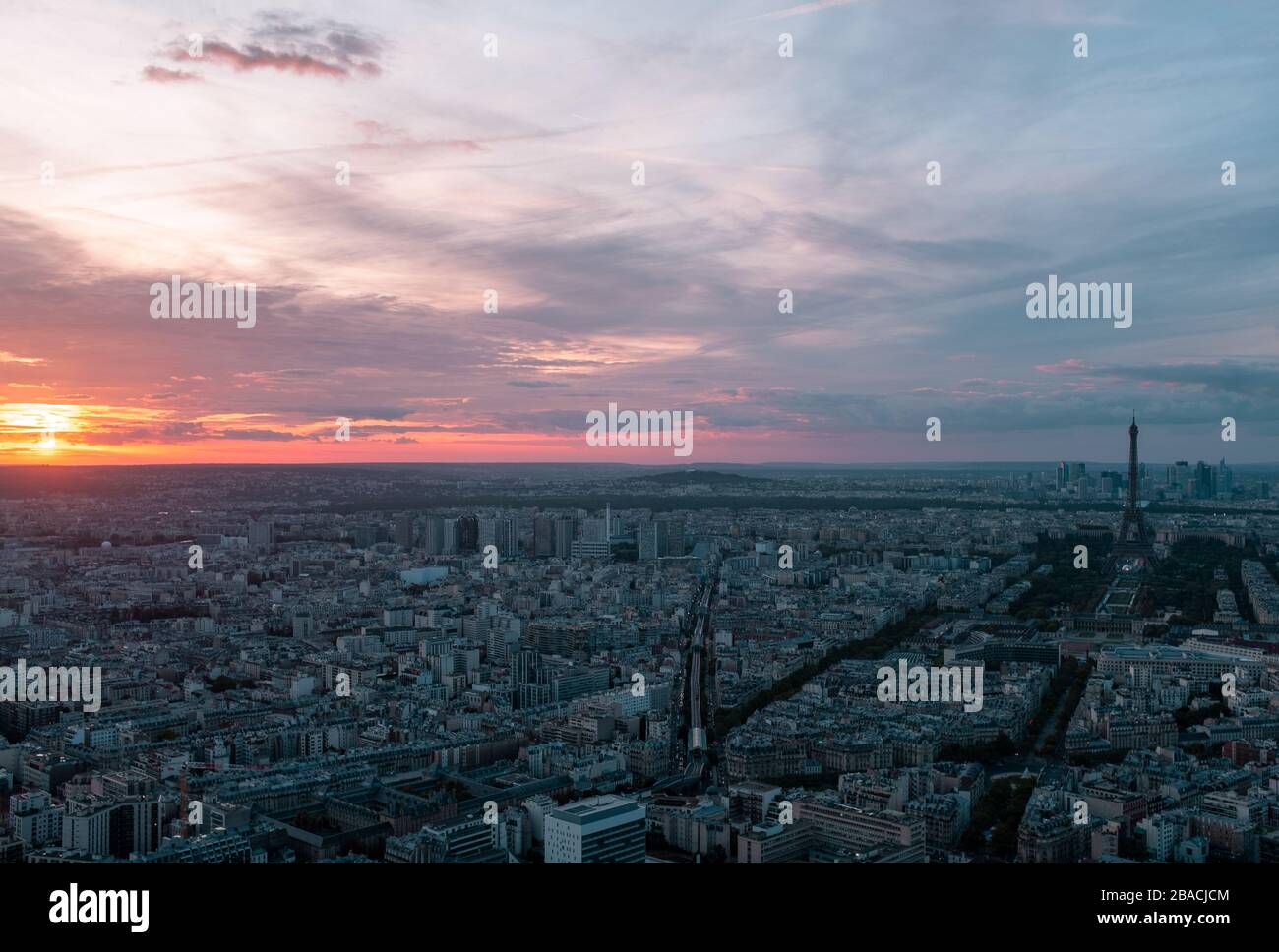Paris skyline at sunset Stock Photo - Alamy
