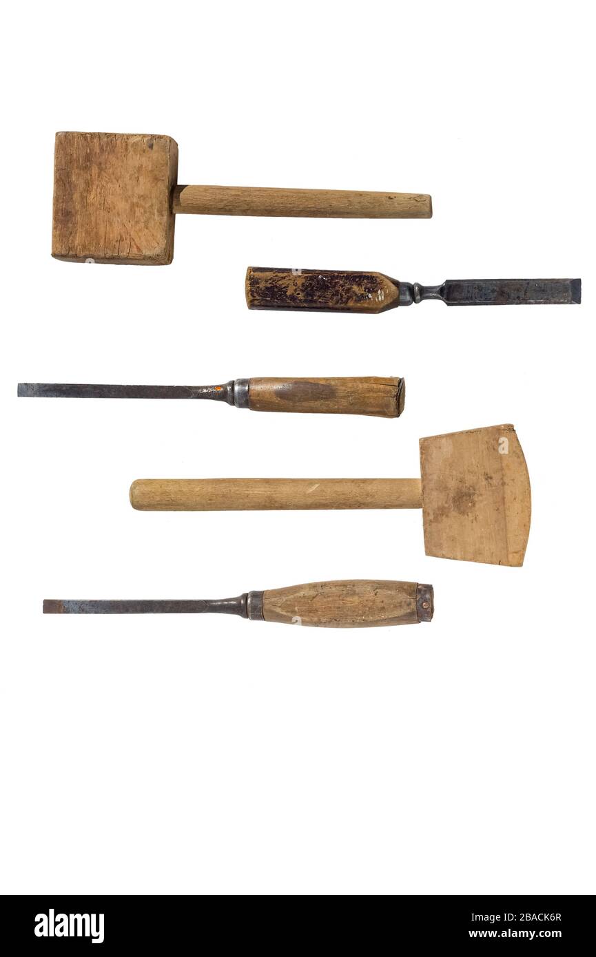Three old chisels and Two old wooden mallet. Isolated on a white ...