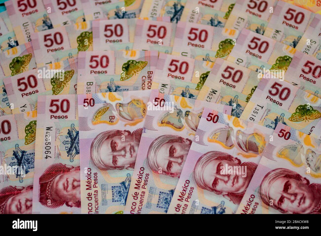Mexican pesos, the cash and currency of Mexico Stock Photo - Alamy