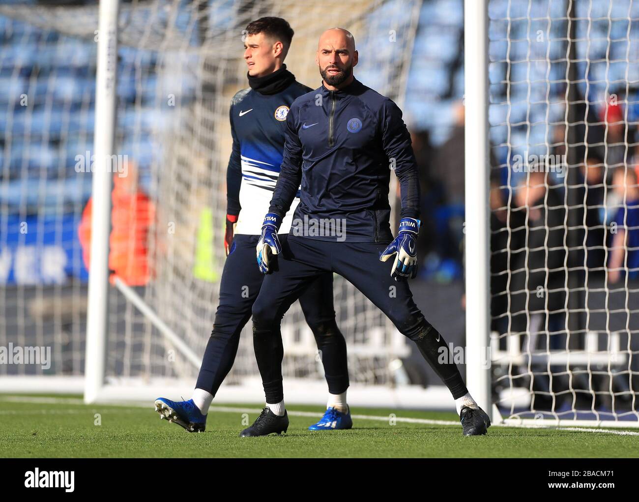 Chelsea goalkeeper Kepa Arrizabalaga (left) and Willy Caballero warming ...