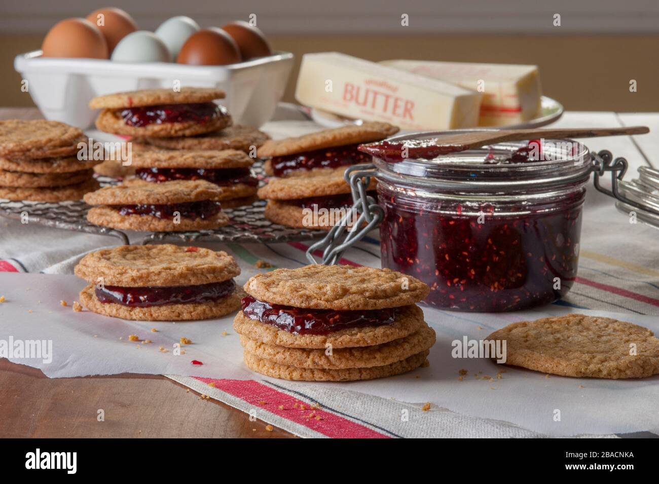 Preparing jam filled ginger cookes Stock Photo - Alamy