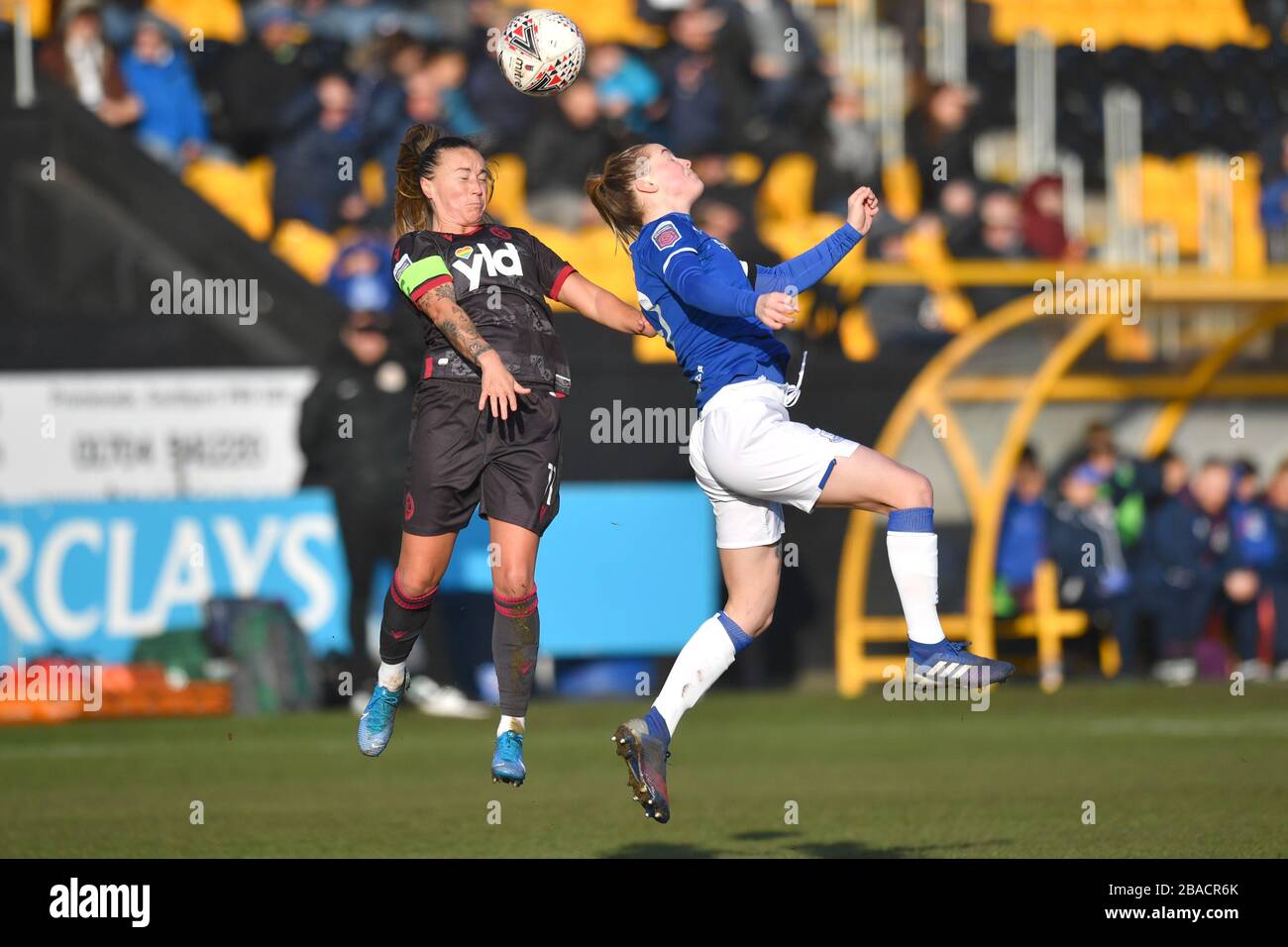 Everton’'s Lucy Graham (right) and Reading’'s Natasha Harding compete ...