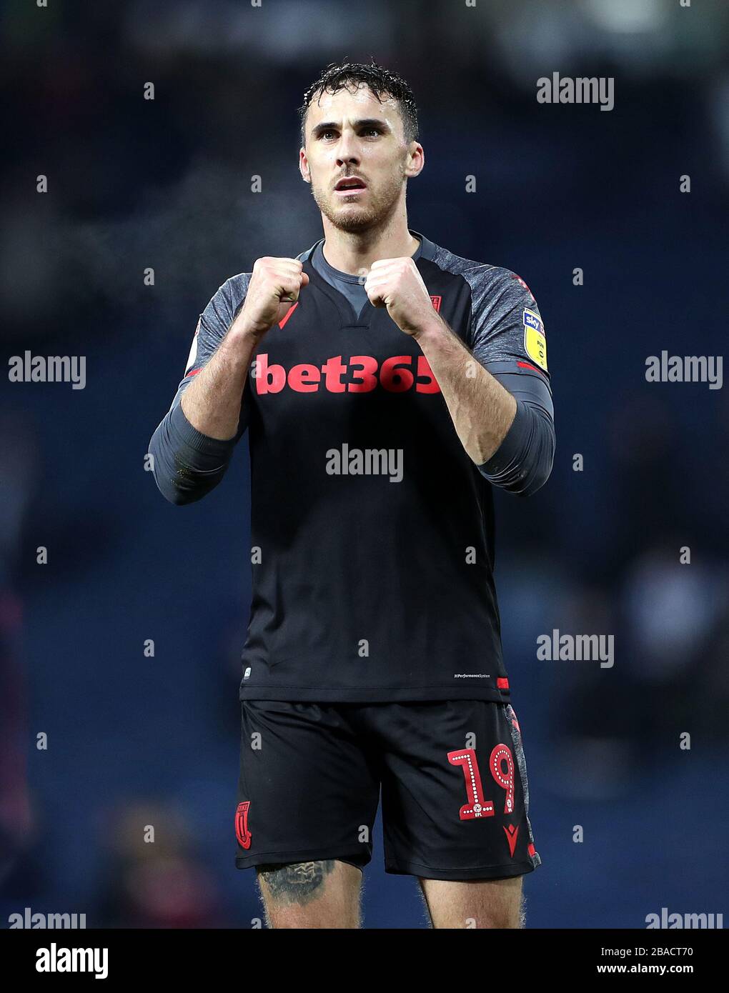 Stoke City's Lee Gregory celebrates after the game Stock Photo - Alamy