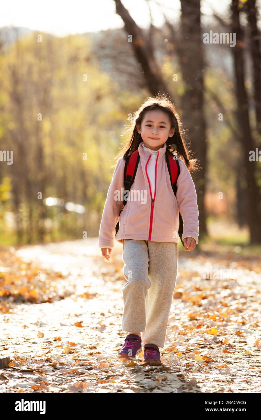 Autumn outside lane cute girl Stock Photo - Alamy