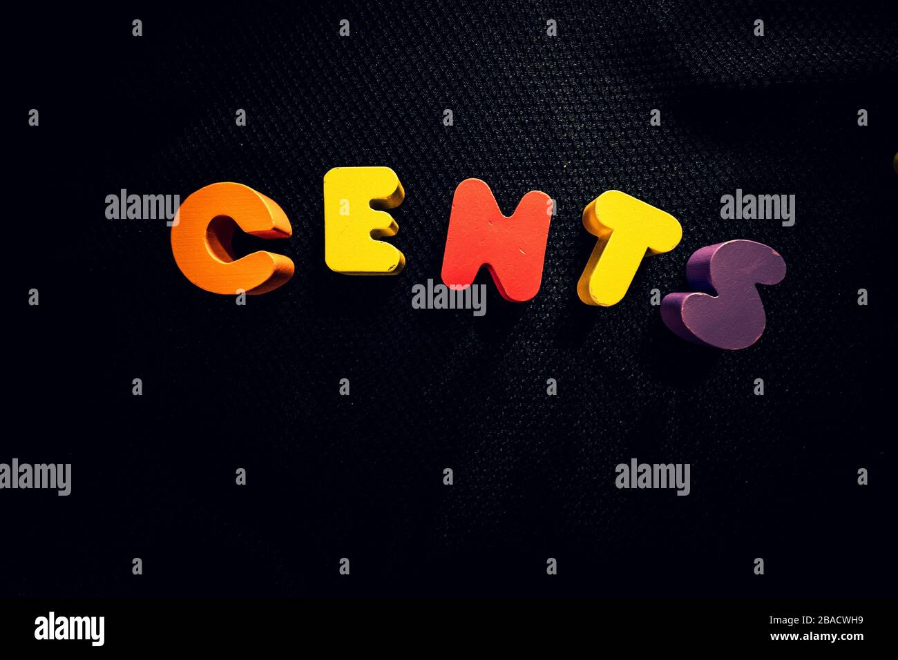 colorful cents 3d text on black background Stock Photo - Alamy