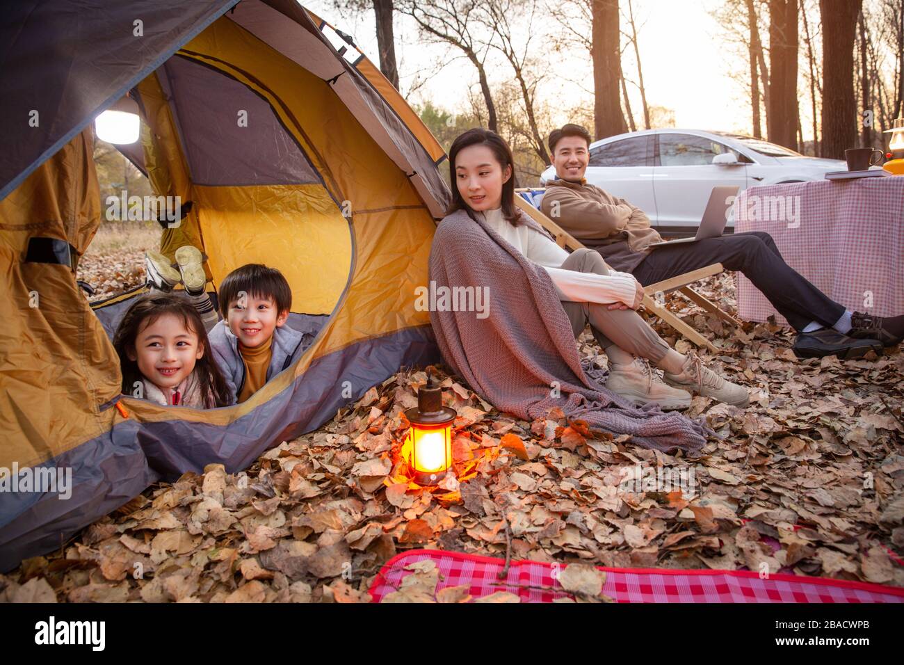 Happy family outdoor outing Stock Photo - Alamy