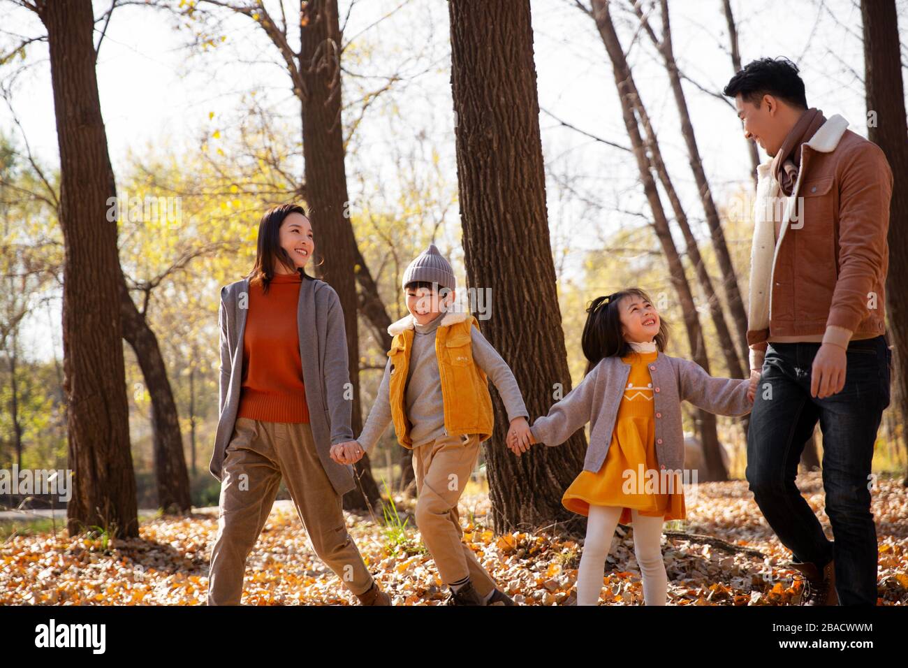 Happy family in the outside for a walk Stock Photo - Alamy