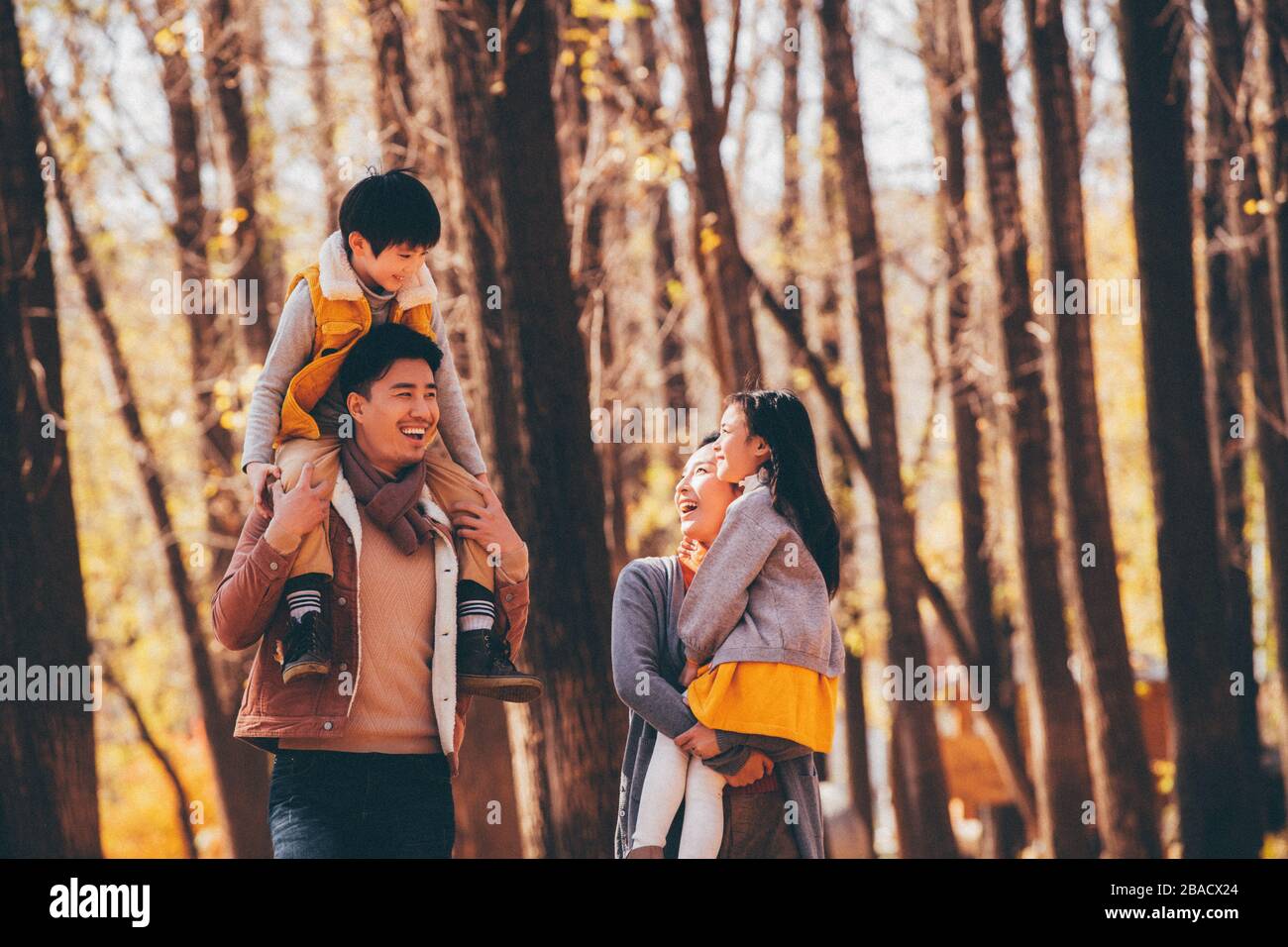 Happy family in the outdoor outing Stock Photo - Alamy