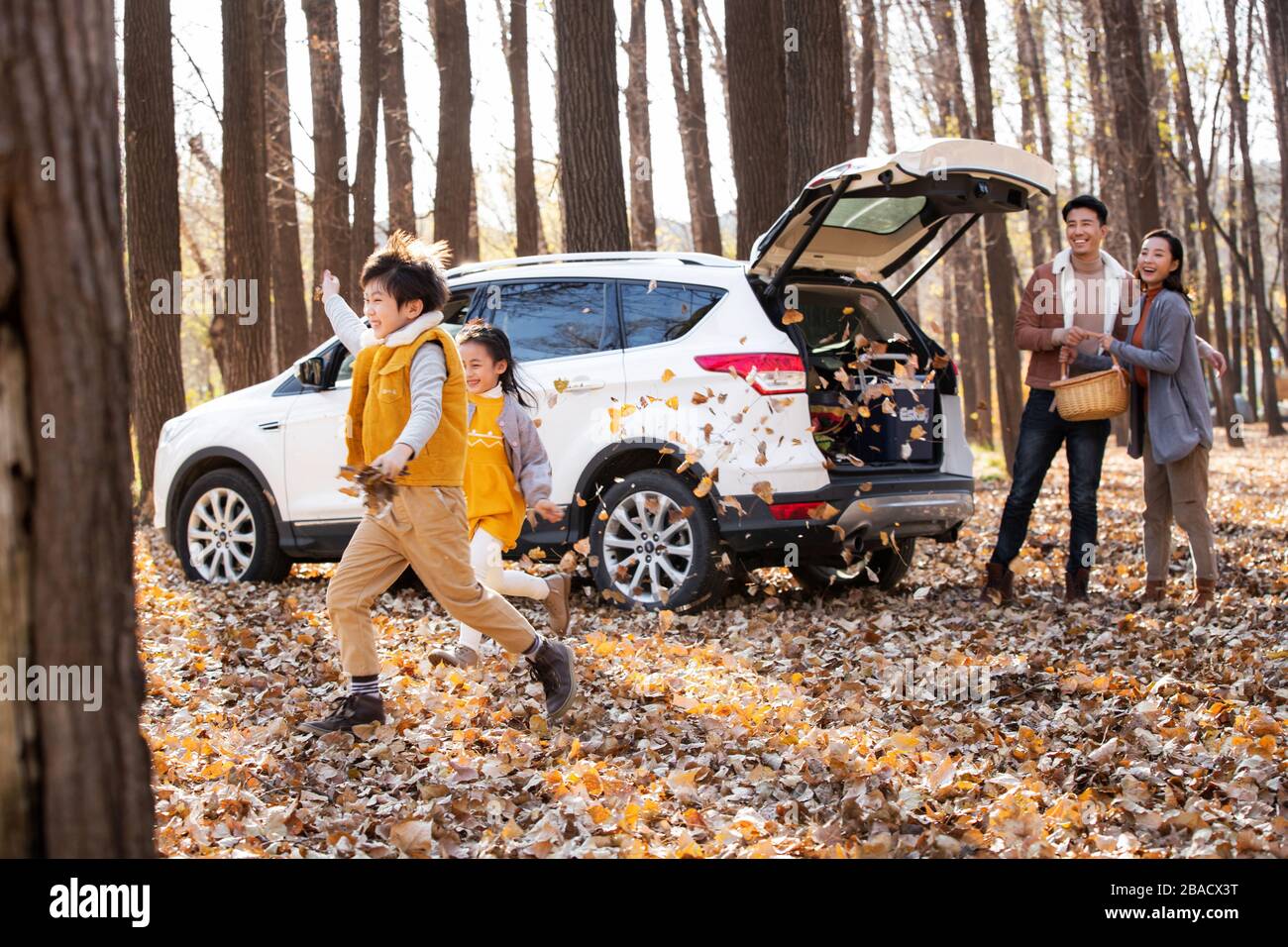 Happy family outdoor outing Stock Photo - Alamy