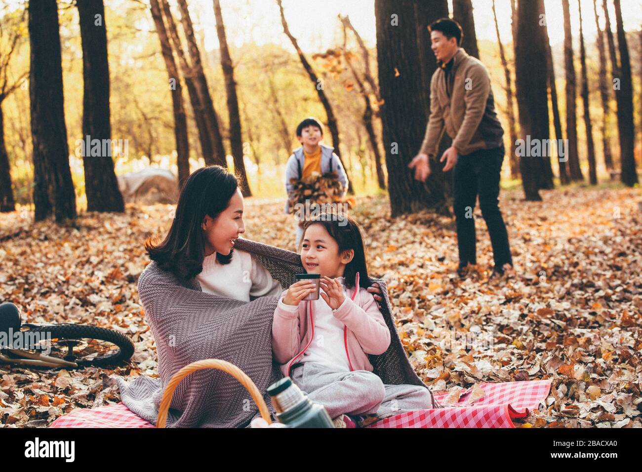 Happy family outdoor camping Stock Photo - Alamy