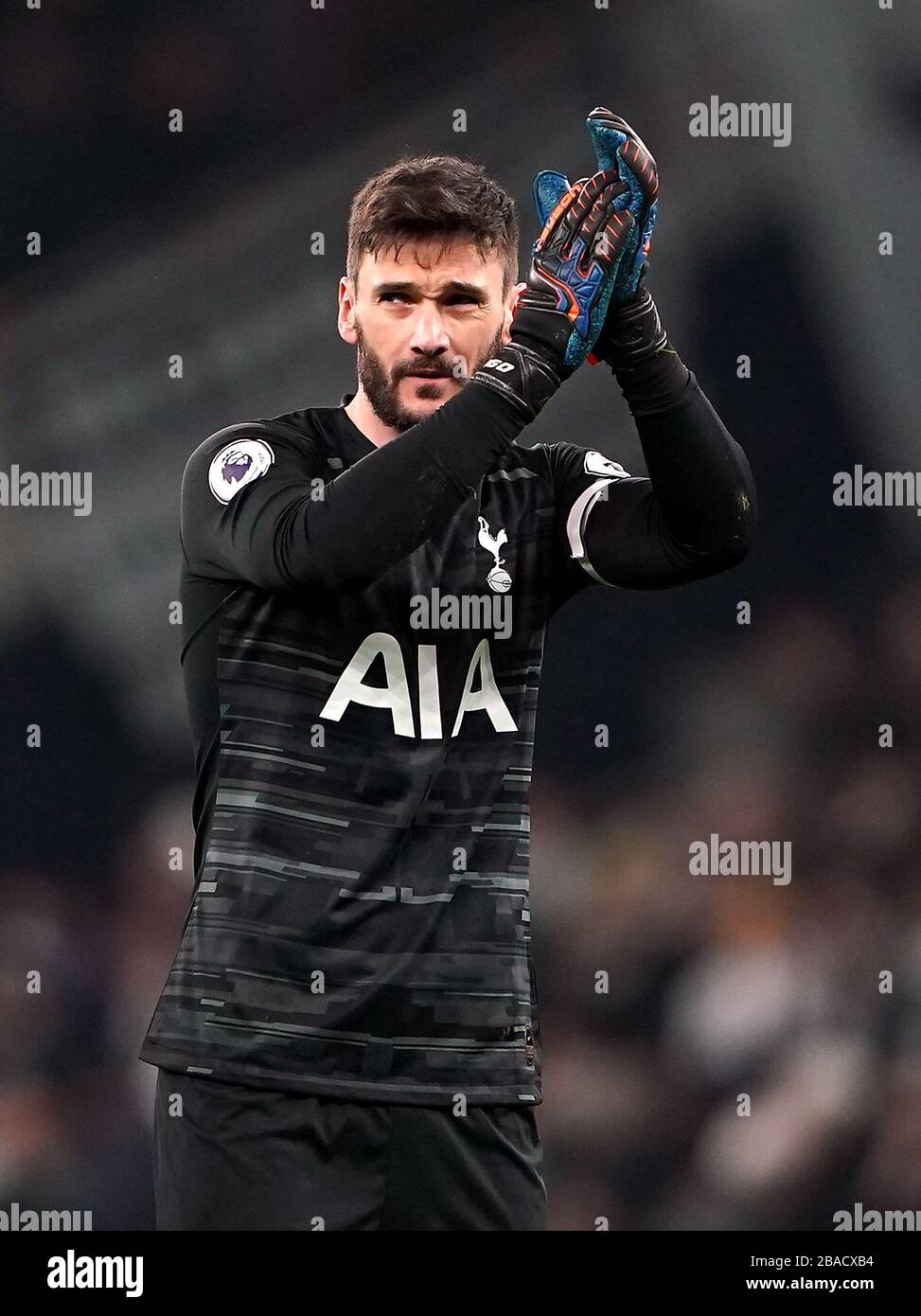 Tottenham hotspur goalkeeper applauds the fans hi-res stock photography ...