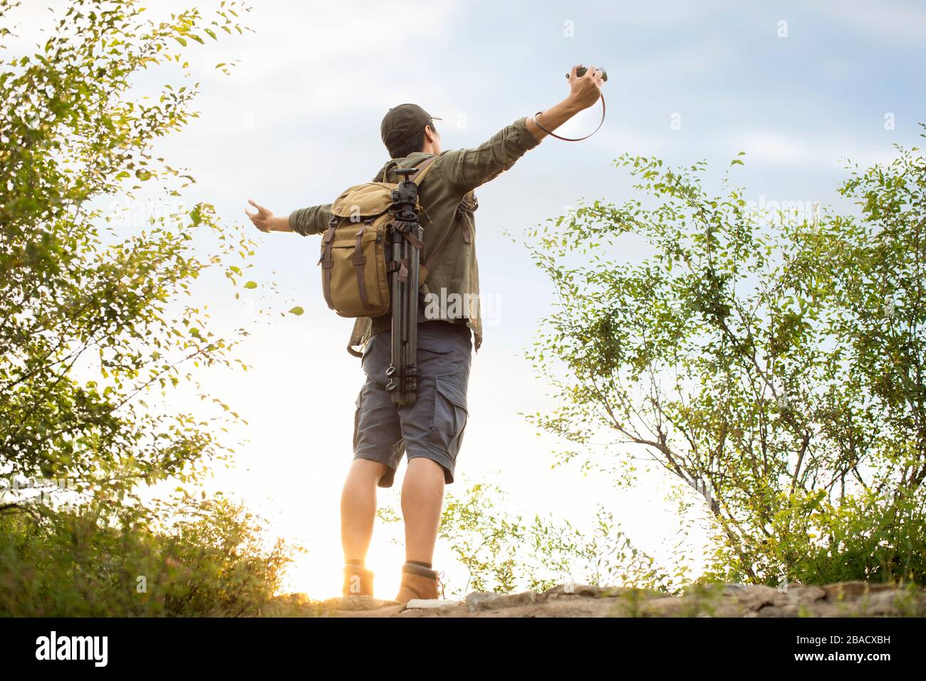Young chinese man standing hi-res stock photography and images - Alamy