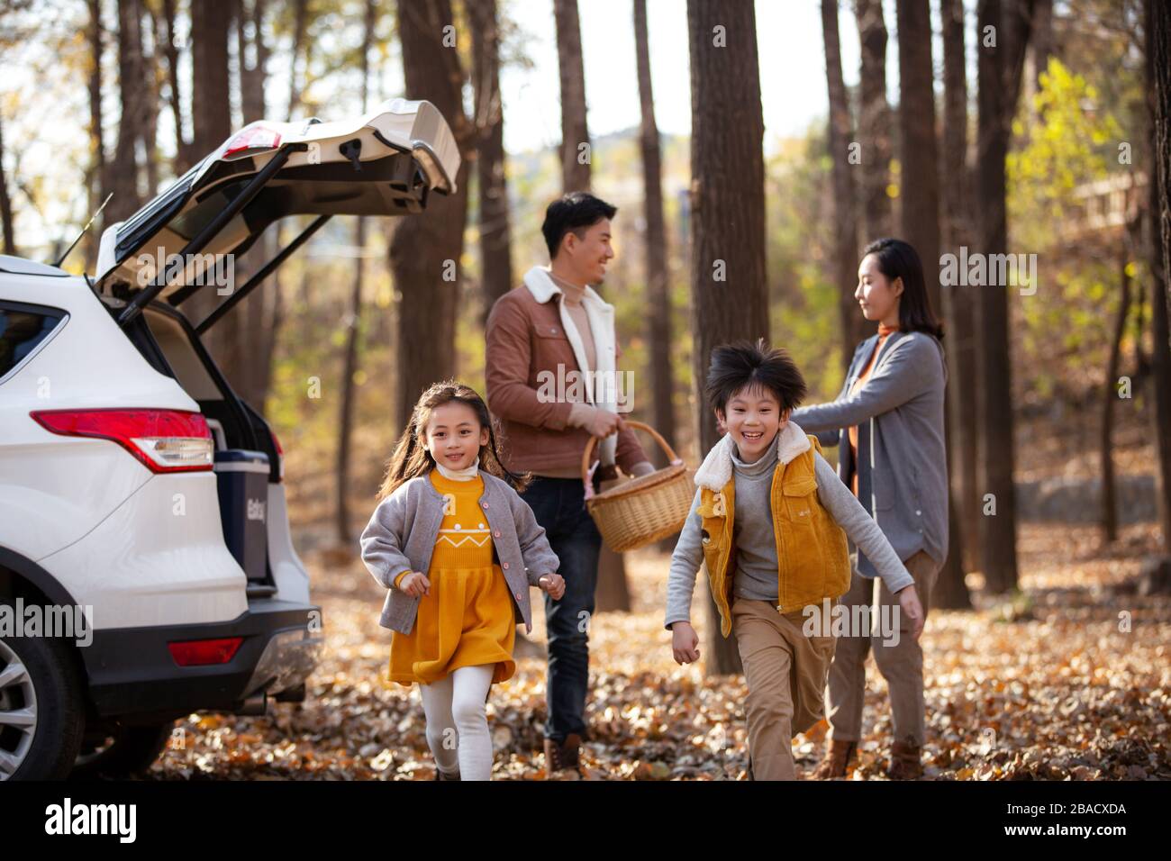 Happy family outdoor outing Stock Photo - Alamy