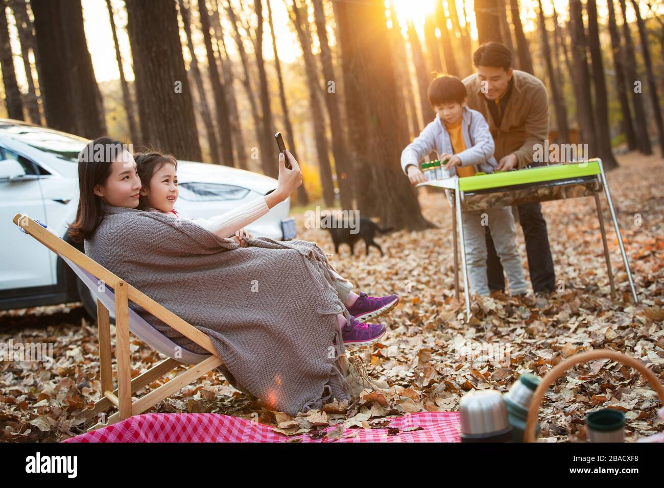 Happy family outdoor outing Stock Photo - Alamy