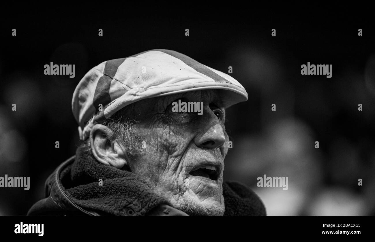 Fan in hat Black and White Stock Photos & Images - Alamy