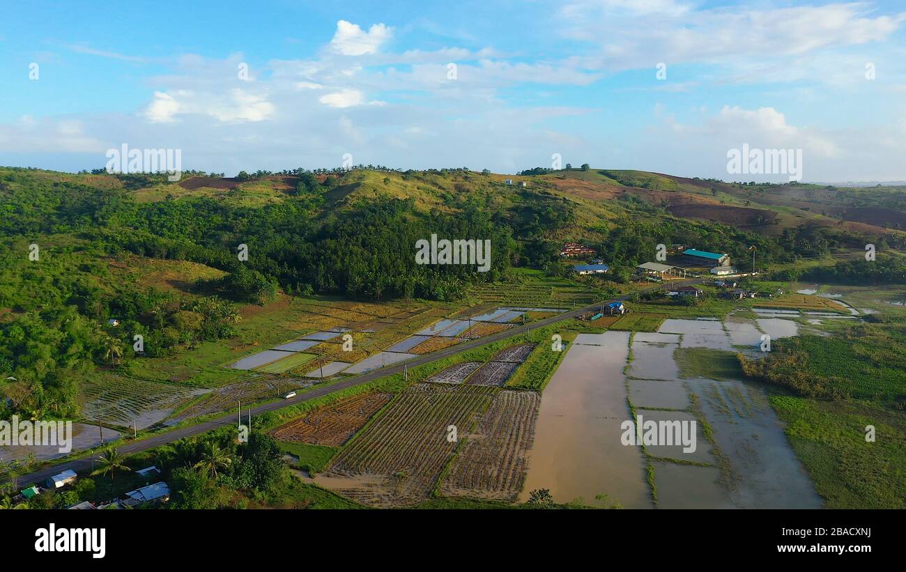 Landscape with farmland and green hills, aerial view. The nature of ...