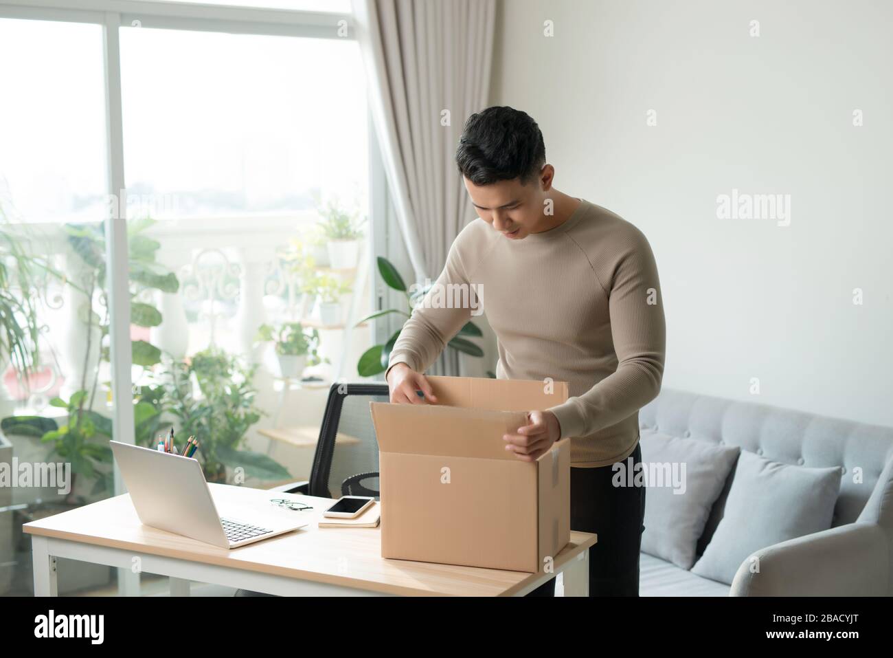 Unpacking goods hi-res stock photography and images - Alamy