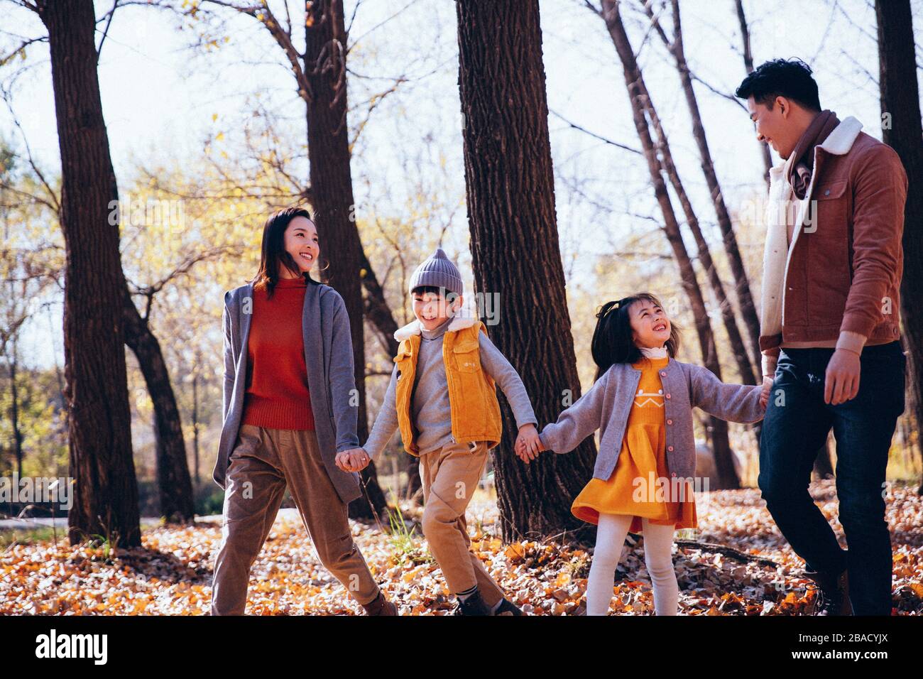 Happy family in the outside for a walk Stock Photo - Alamy