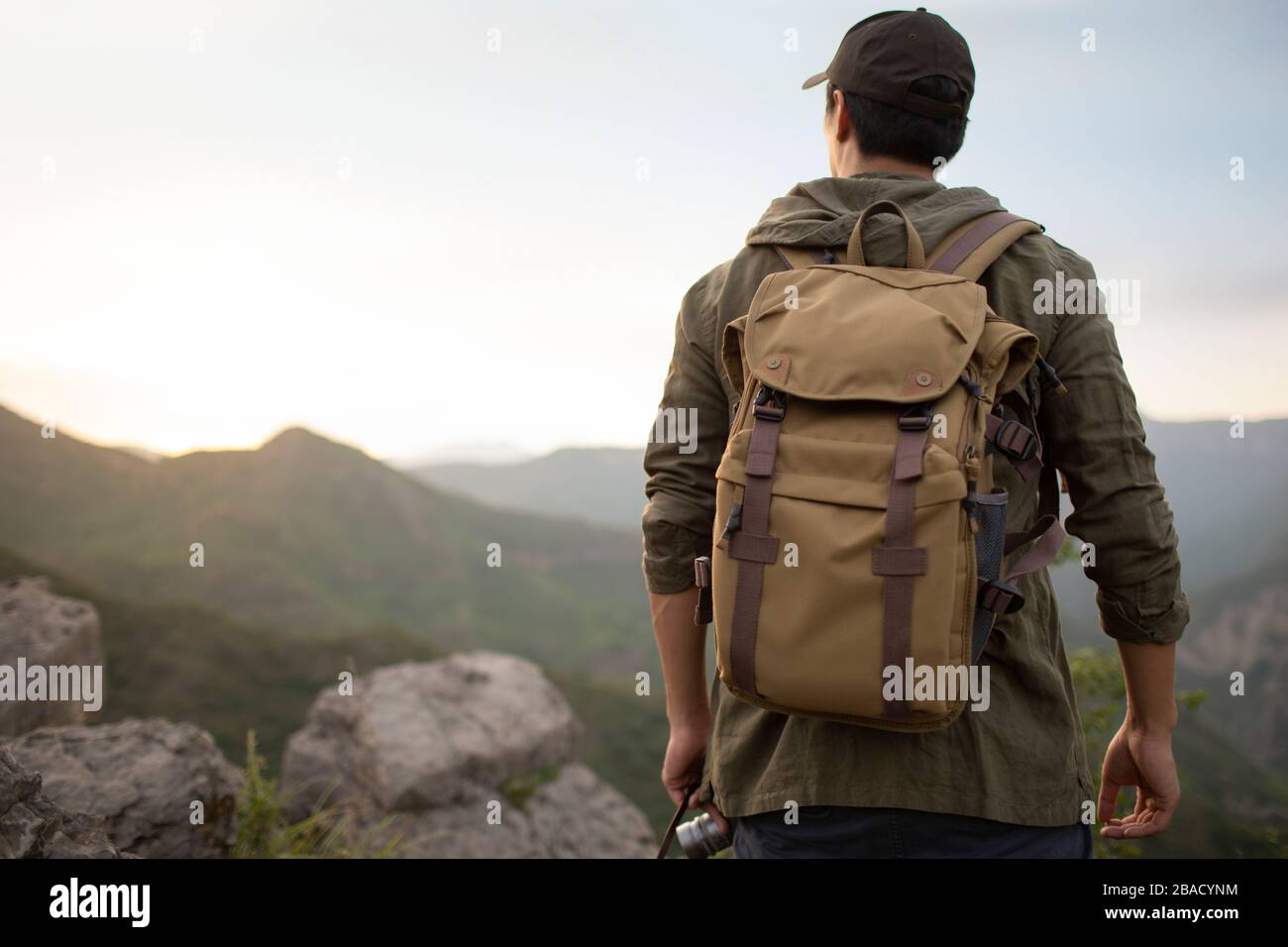 Young chinese man standing hi-res stock photography and images - Alamy