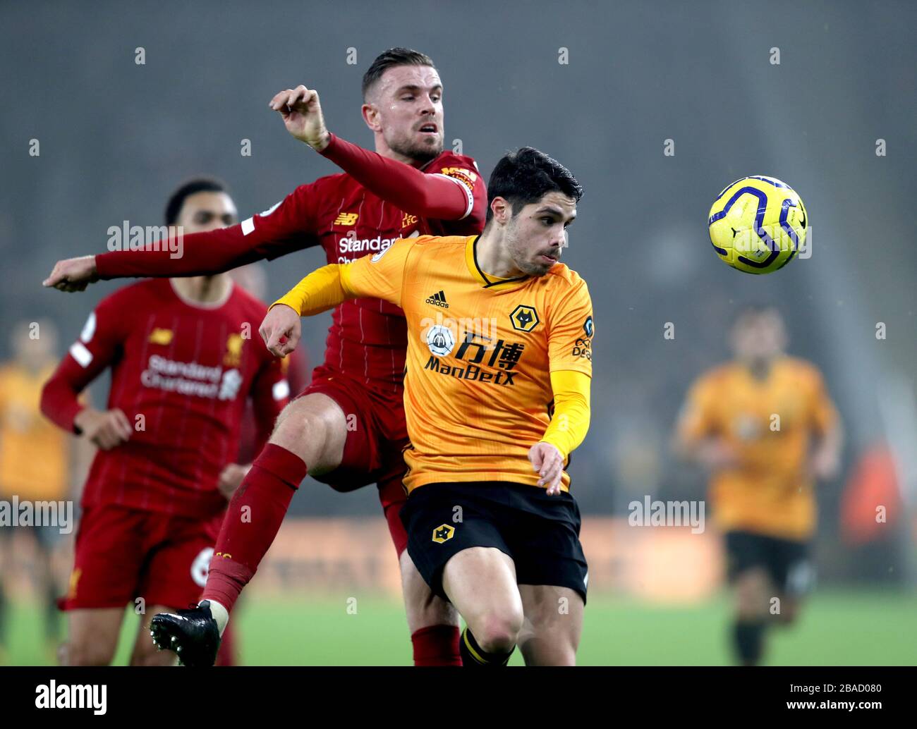 Liverpool's Jordan Henderson (left) and Wolverhampton Wanderers' Pedro ...