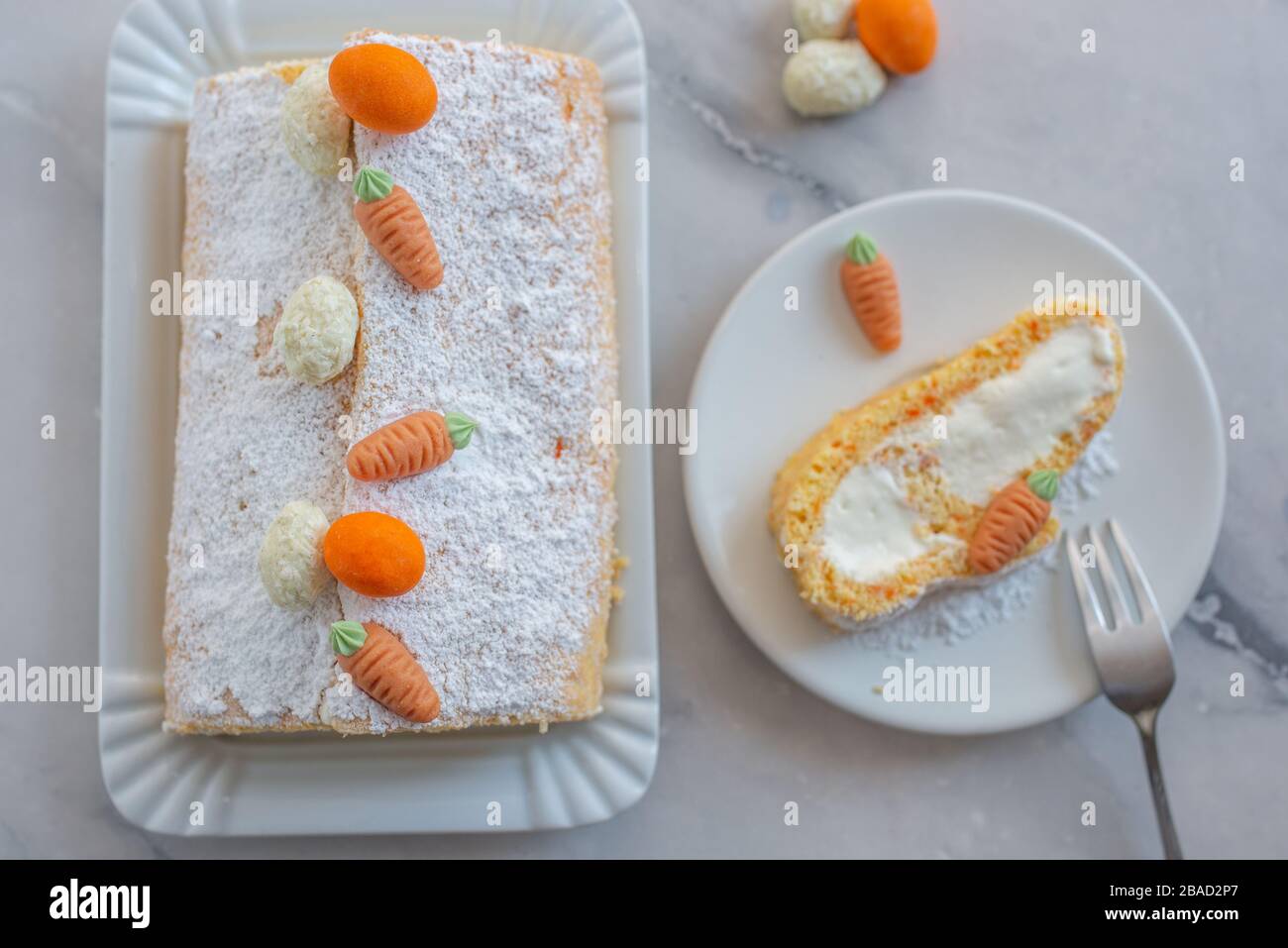home made Easter sponge roll with carrots on a table Stock Photo - Alamy