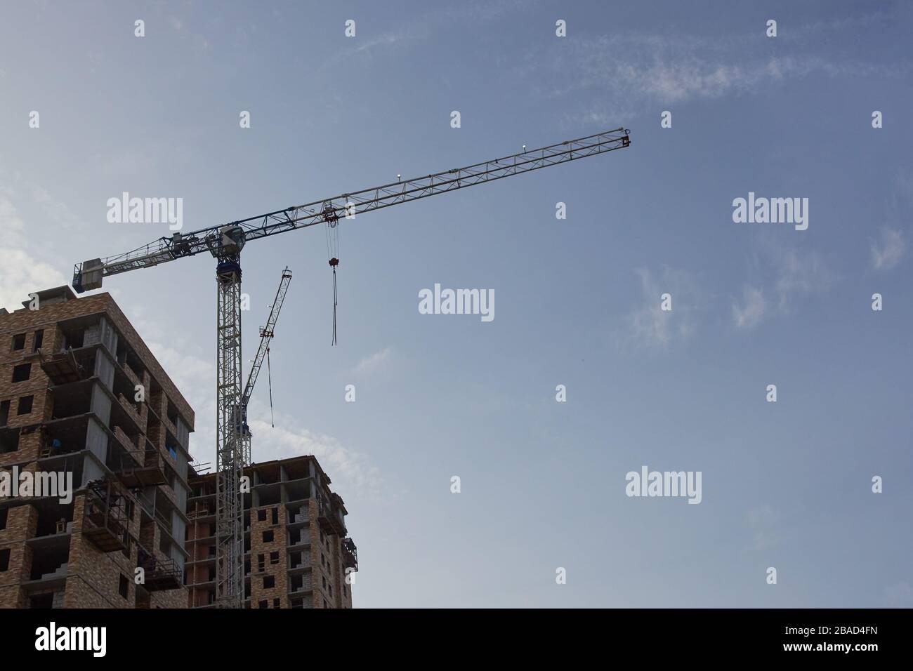 Industrial construction cranes the construction of an building Stock ...