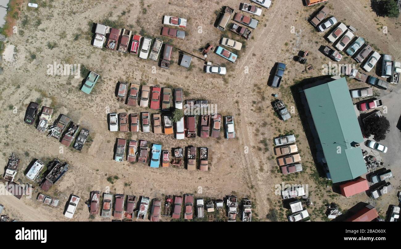 Overhead view of old cars gathered in a countryside parking Stock Photo ...