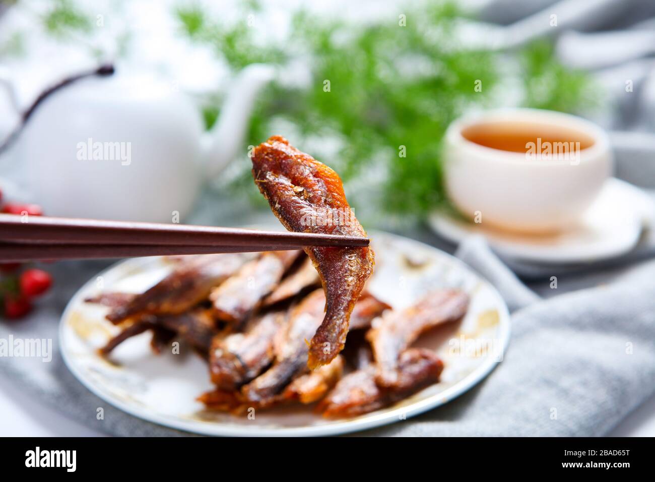 Crispy Fried small yellow croaker Stock Photo - Alamy