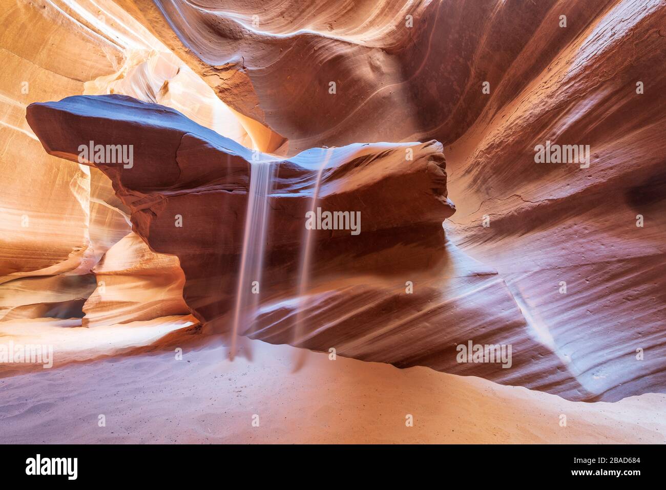Antelope Canyon, USA. Sand flowing downward from rocks Stock Photo - Alamy
