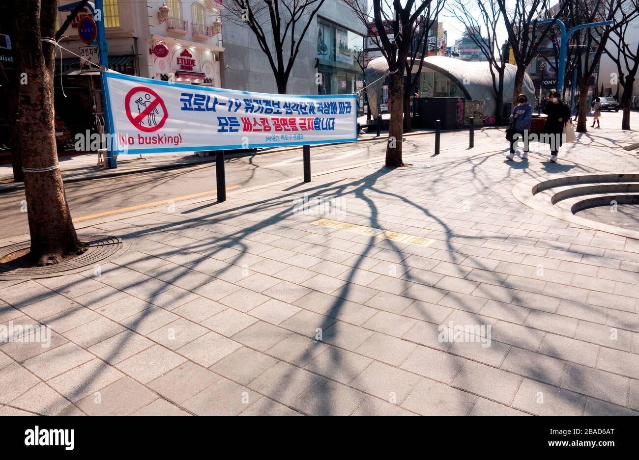 The COVID-19 in South Korea, Mar 18, 2020 : Wearing masks, people walk ...