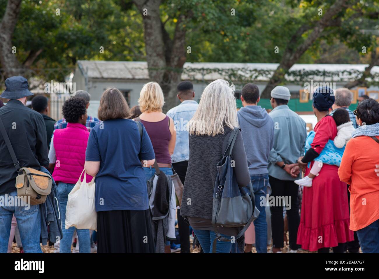 Group of people staring at performance Stock Photo - Alamy