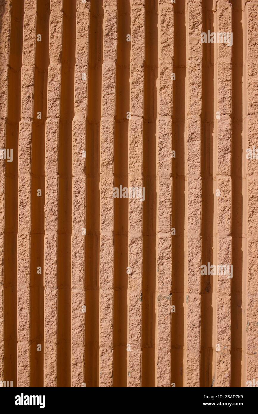 Exterior brownstone wall texture background with vertical stripe molded ...
