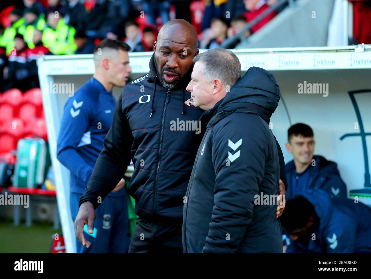 Doncaster Rovers manager Darren Moore with Coventry City manager Mark ...