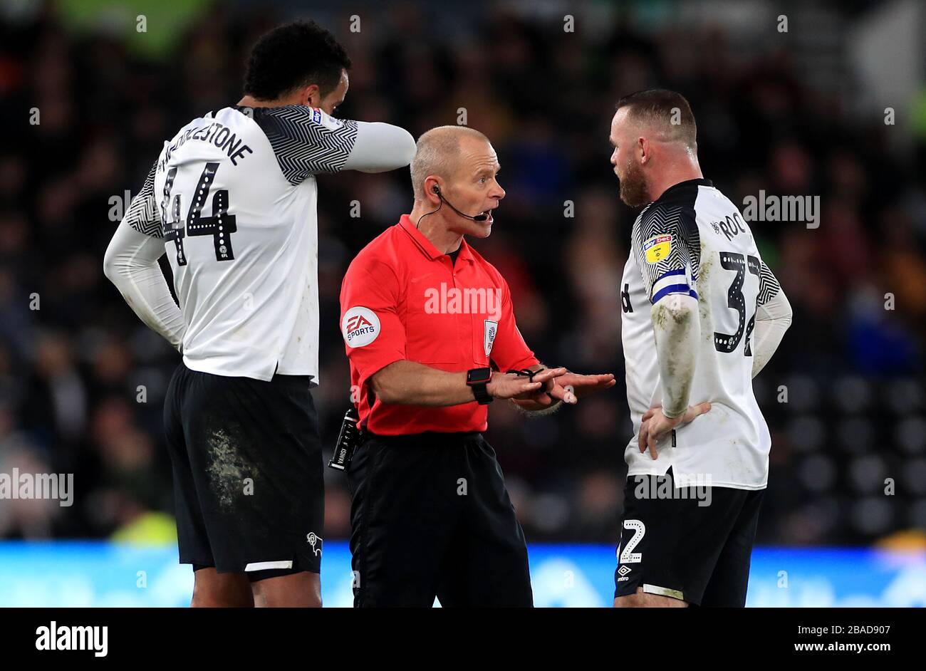 Referee Andy Woolmer has words with Derby County's Wayne Rooney Stock ...