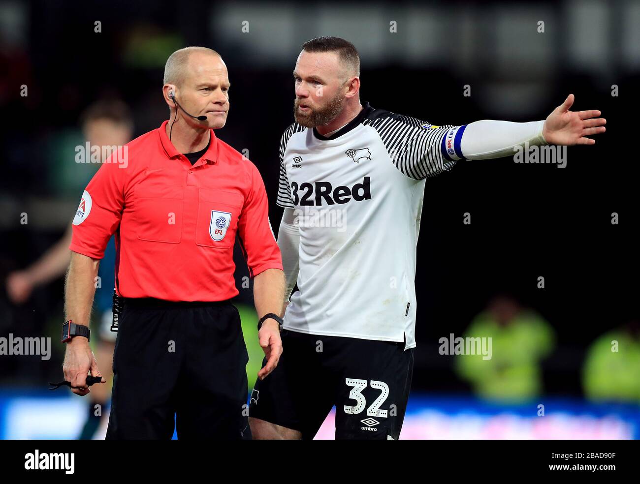 Derby County's Wayne Rooney talks to referee Andy Woolmer Stock Photo ...