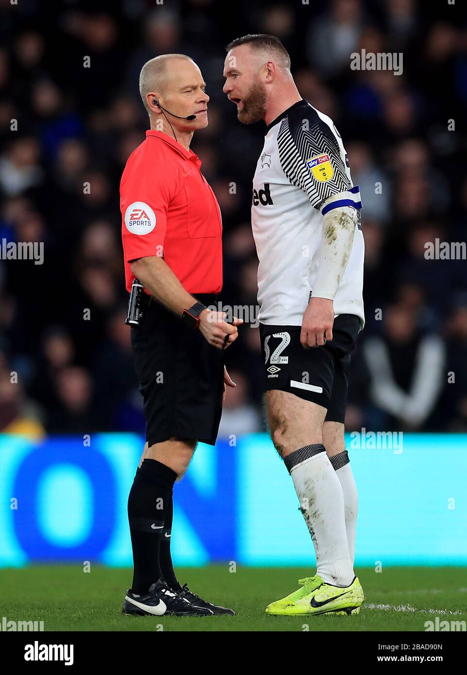 Derby County's Wayne Rooney talks to referee Andy Woolmer Stock Photo ...