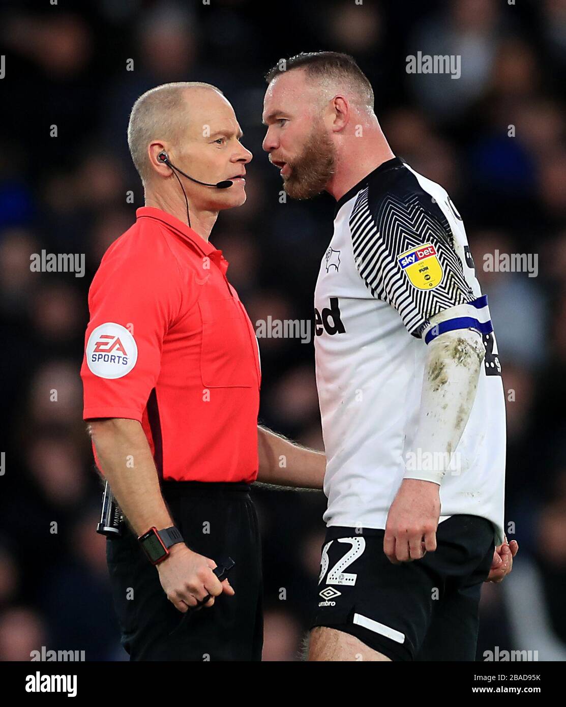 Derby County's Wayne Rooney talks to referee Andy Woolmer Stock Photo ...
