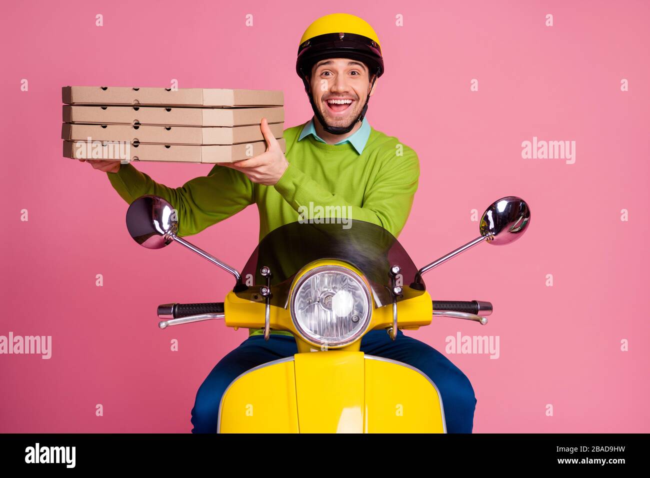 Man carrying motorcycle helmet hi-res stock photography and images - Alamy